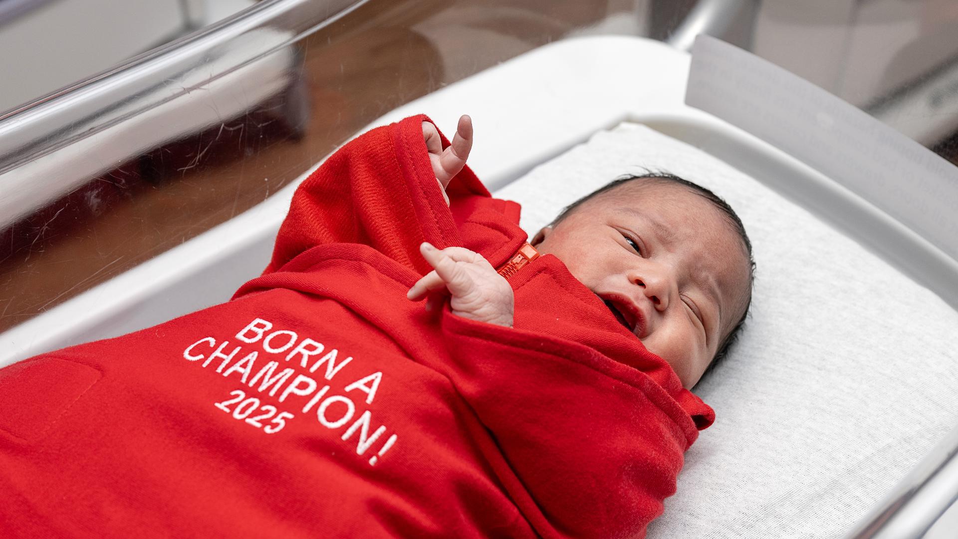 Newest 'champion babies' welcome reigning Buckeyes home after Notre ...