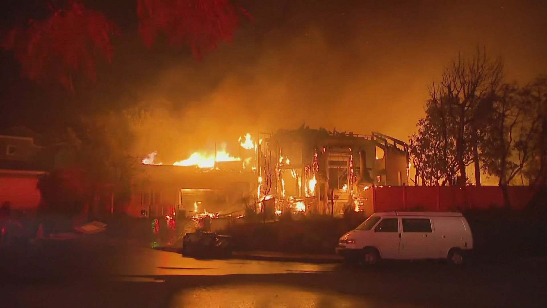 Thousands flee as wildfires burn out of control in and around Los Angeles, homes destroyed ...