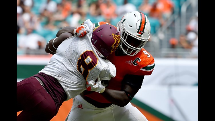PHOTOS | Cleveland Browns select former Miami DE Chad Thomas with No ...