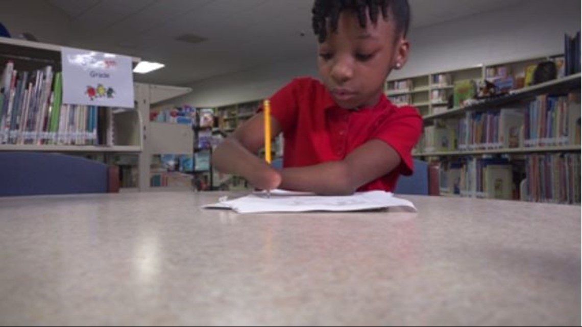 3rd grader born without hands wins national penmanship award | wkyc.com