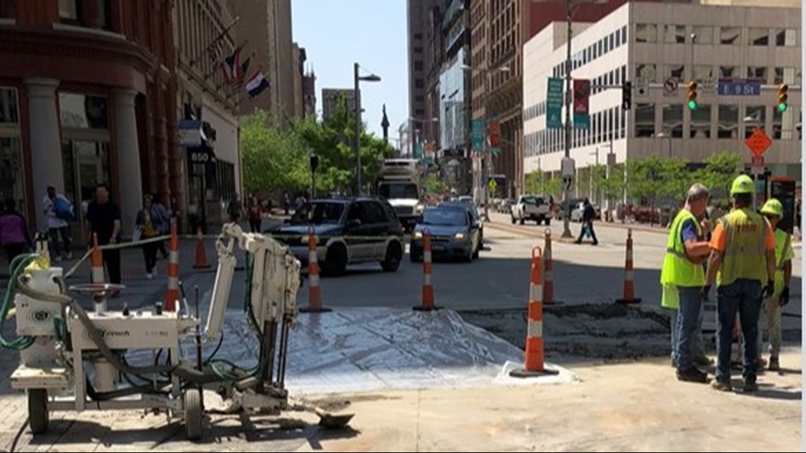 Driver gets stuck in wet cement in area of E. 9th and Euclid in ...