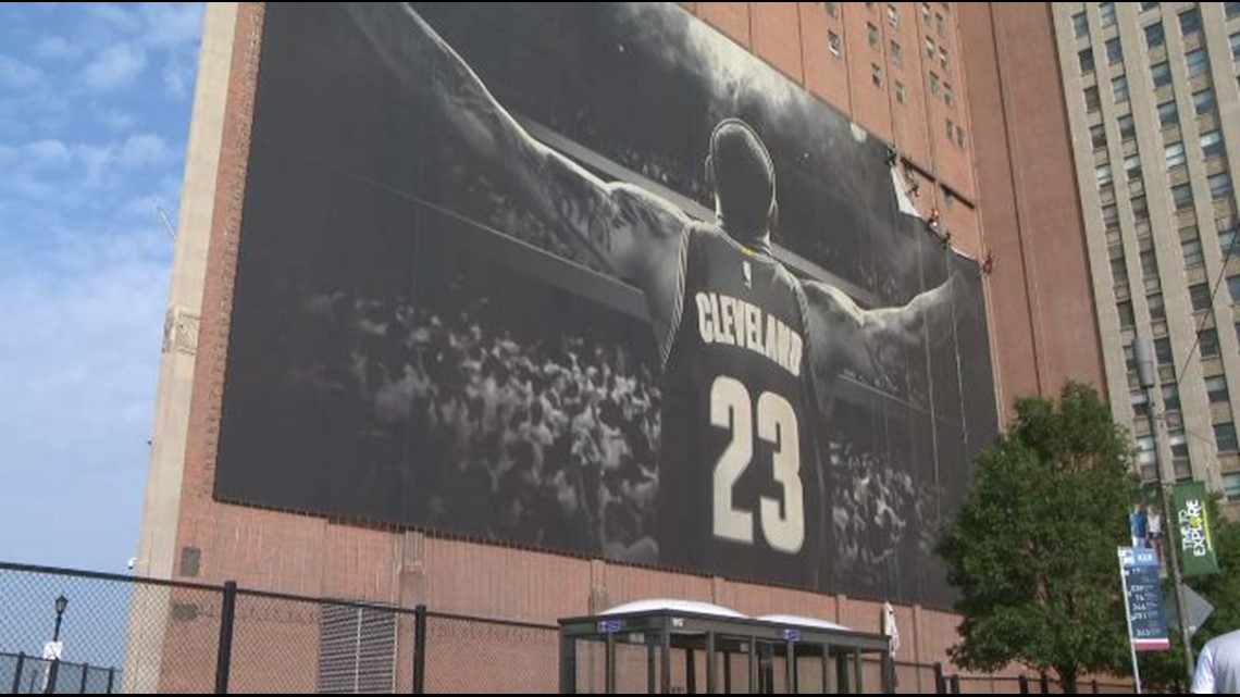 PHOTOS | Iconic LeBron James banner comes down in Cleveland | wkyc.com