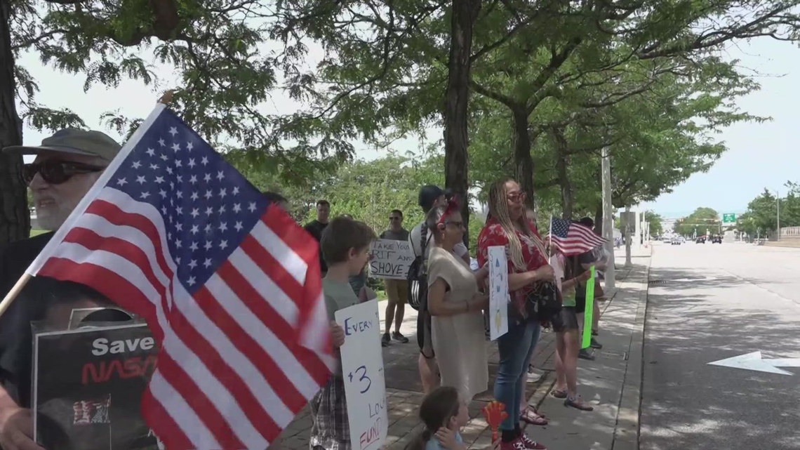 Group protests Trump administration's proposed job cuts at Cleveland's ...