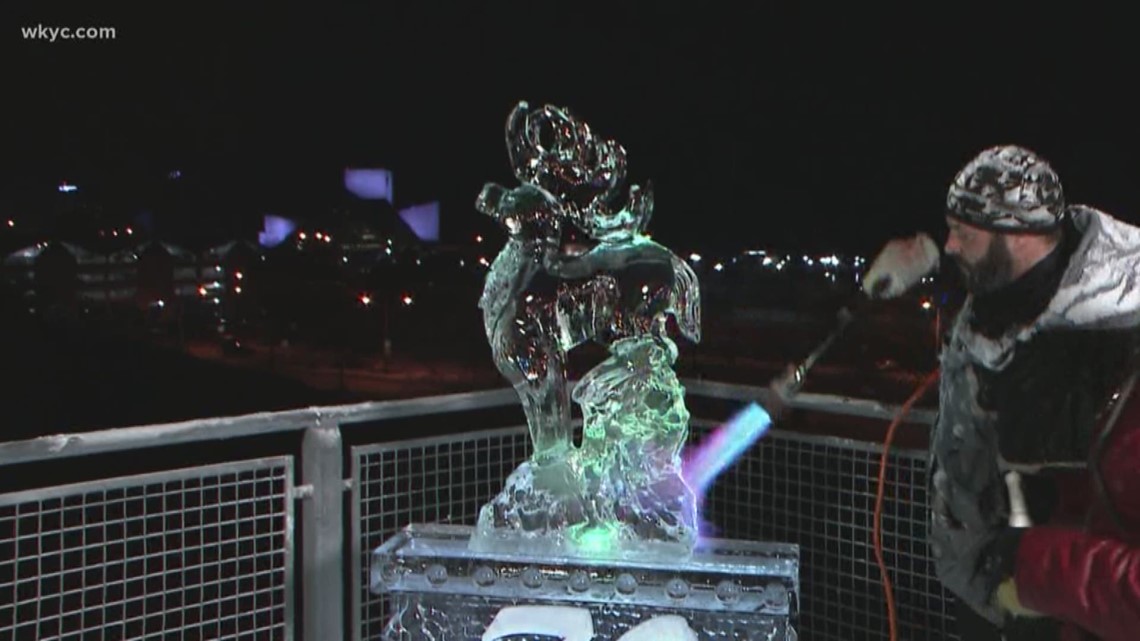 Fire and ice: Finishing ice sculpture touches with a flame thrower ...