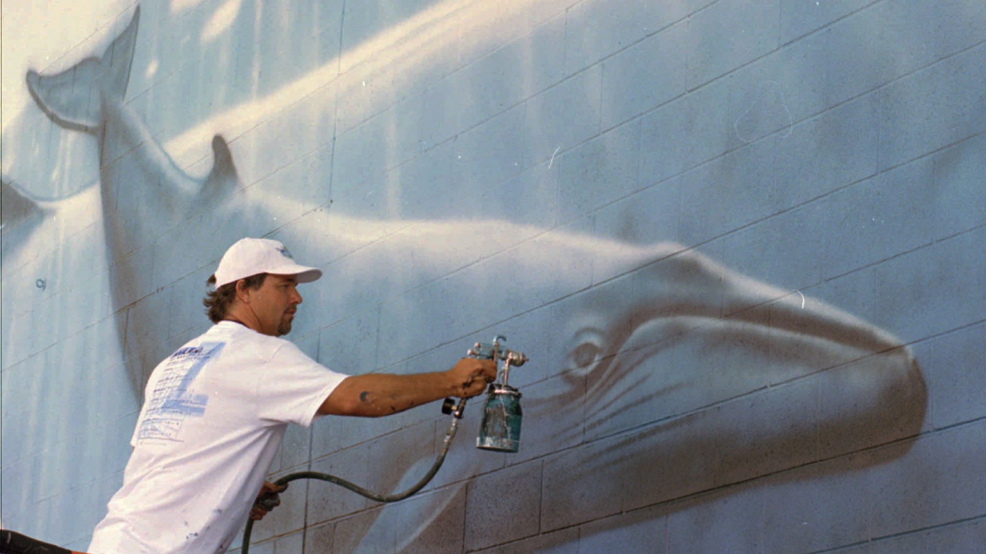 Artist behind iconic Cleveland whale mural to restore artwork on ...