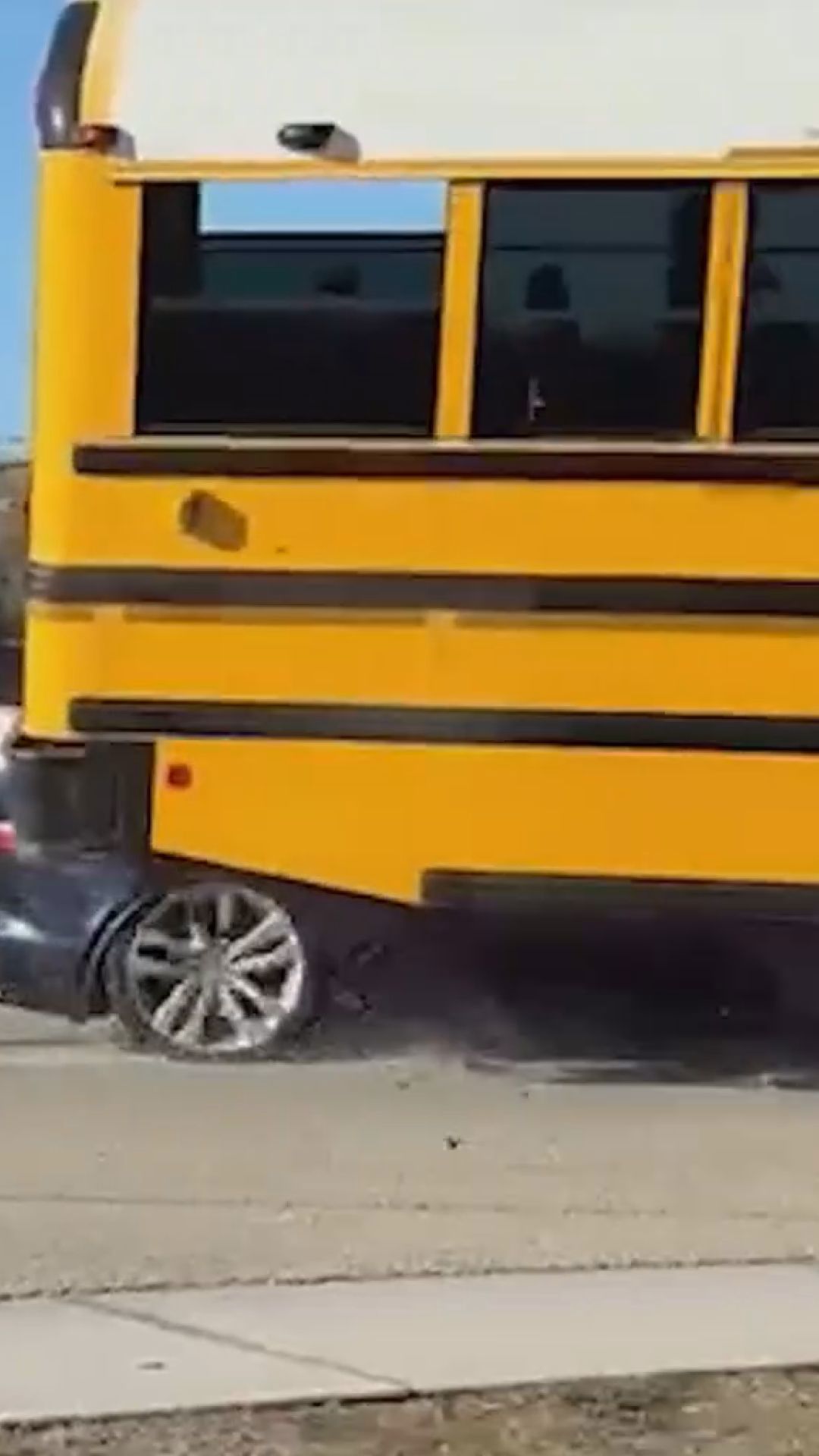 Jaguar slams into school bus, gets wedged underneath in scary crash in ...