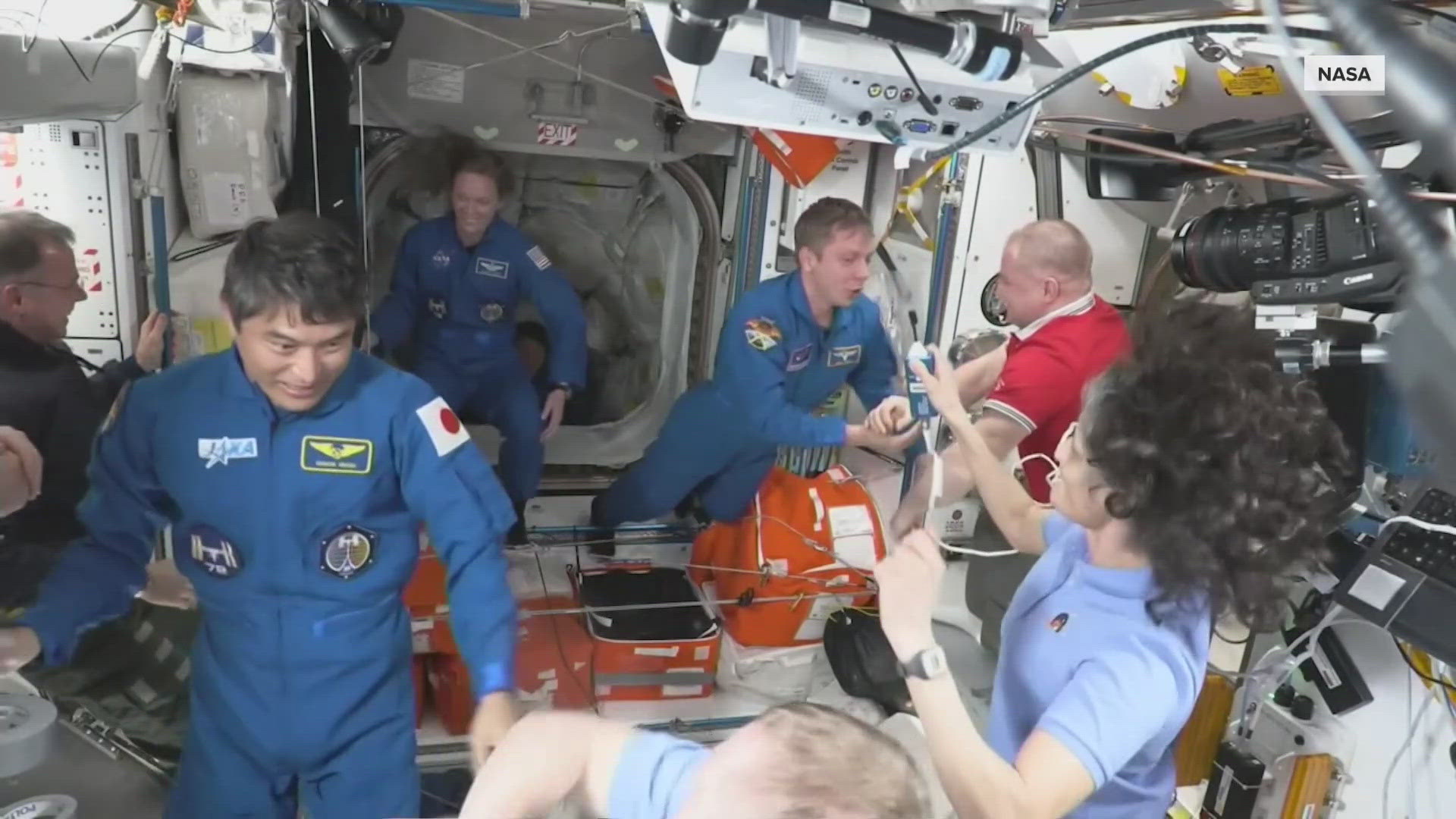 NASA's stuck astronauts greet newly arrived crew to the space station | wkyc.com