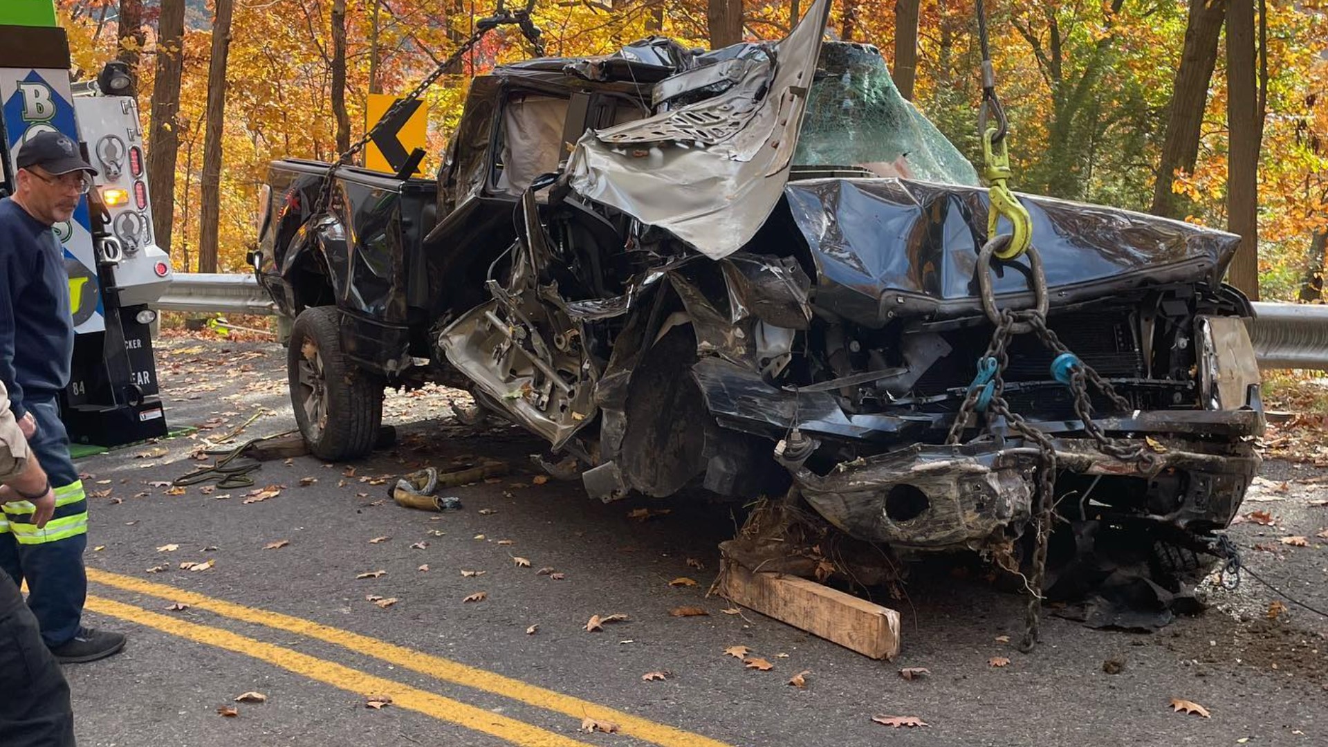 Driver rescued after truck falls down 75-foot ravine in Perry | wkyc.com