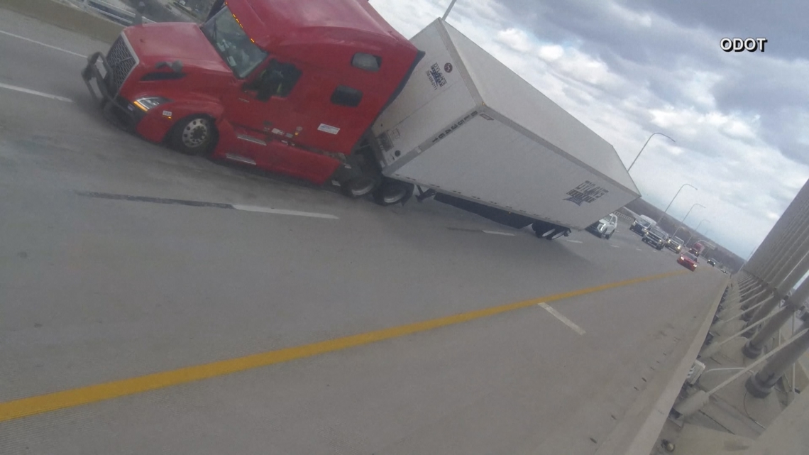 ODOT cameras show strong winds toppling over semi-truck on I-280 in ...