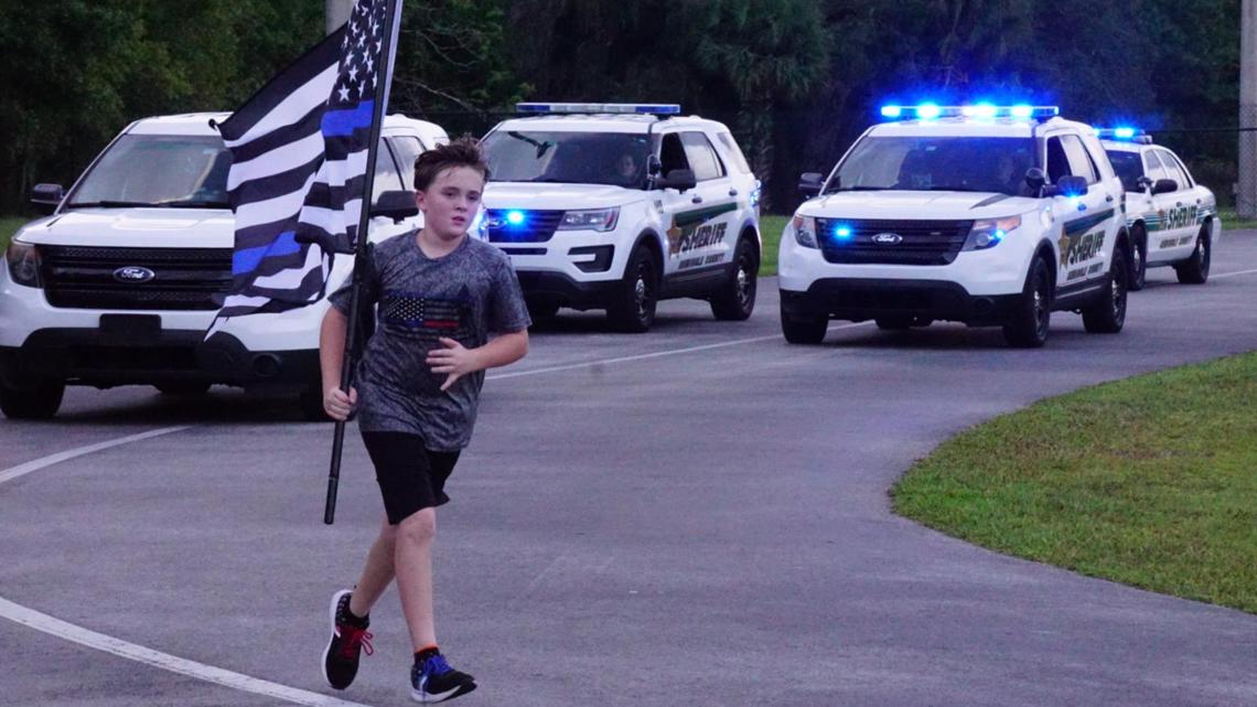 Boy runs to honor Toledo Police Officer Brandon Stalker | wkyc.com