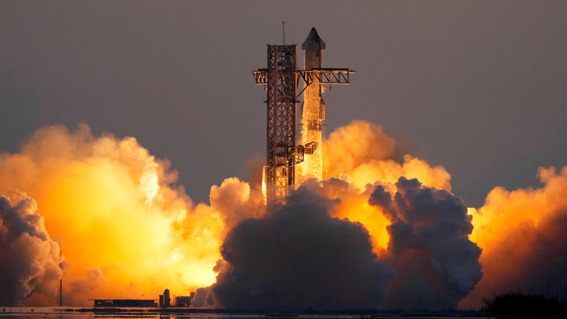 Mechanical SpaceX arms catch Starship rocket booster | wkyc.com